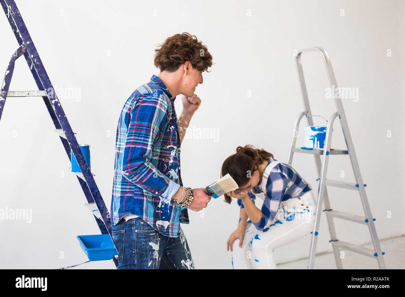 Renovation, conflict,, people and emotions concept - Young woman and ...