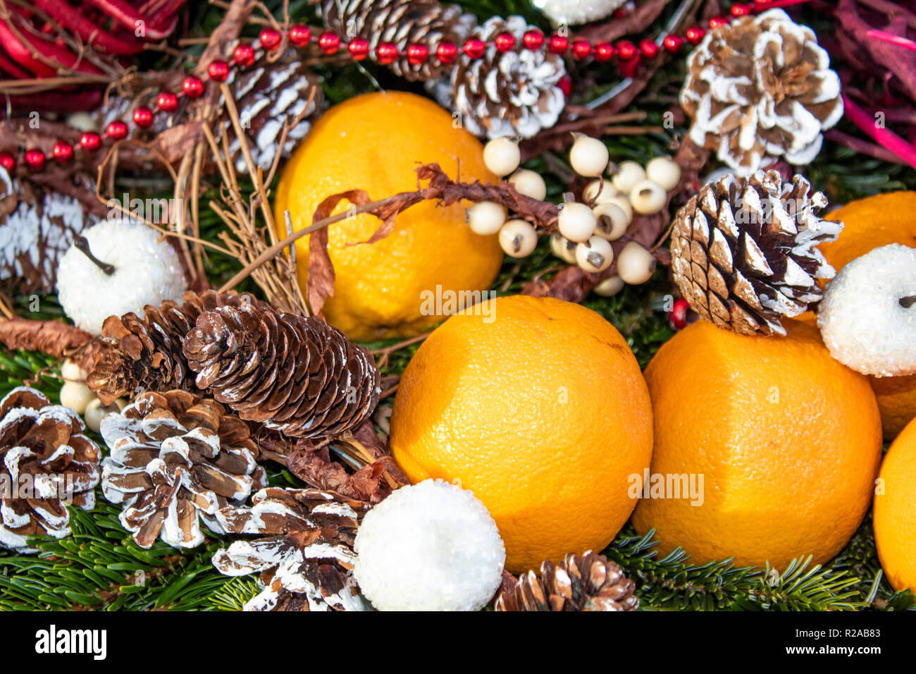 Many Oranges Background with fir cones Stock Photo - Alamy