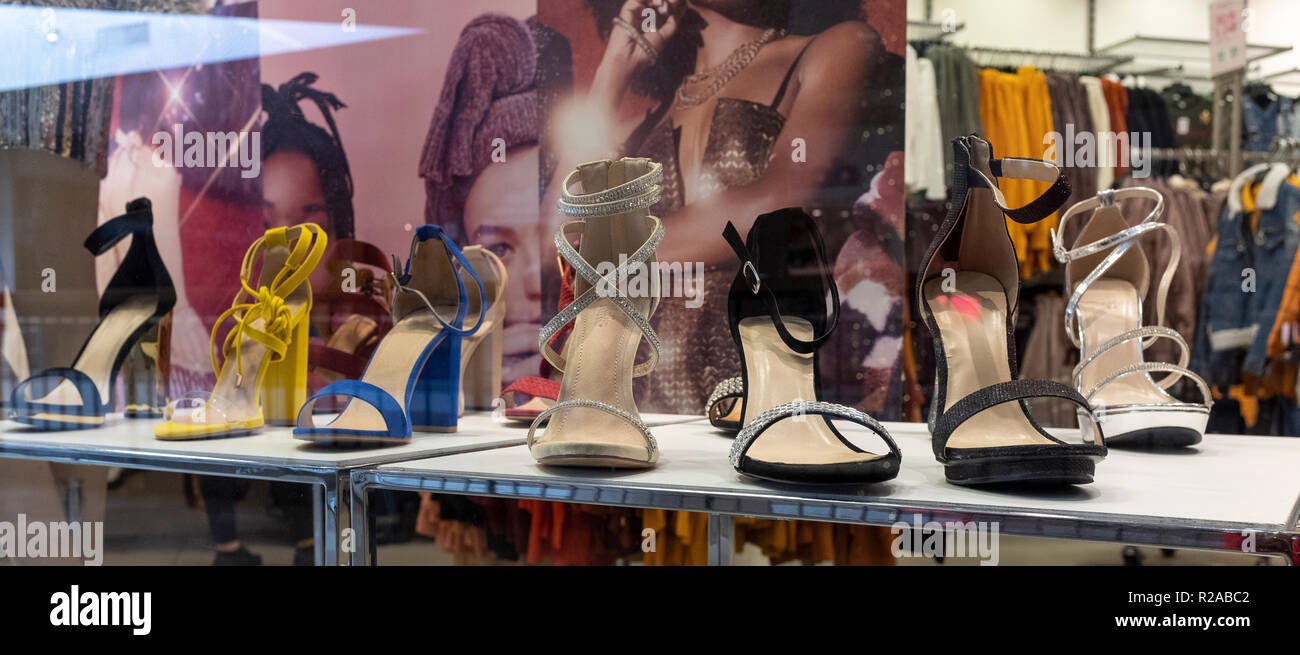 women's high-heeled shoe display Stock Photo - Alamy