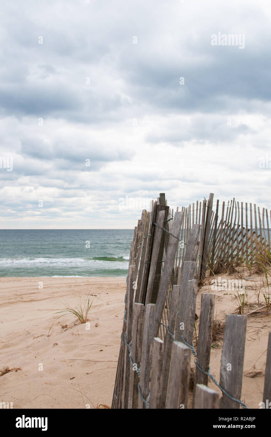 Fence along the beach Stock Photo - Alamy