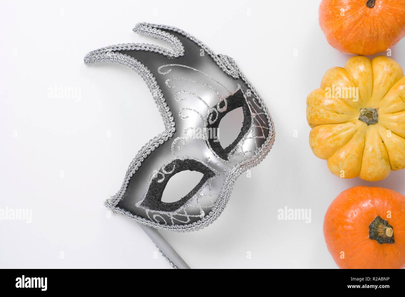Halloween Mask with Miniature Pumpkin and Squash on White Background ...