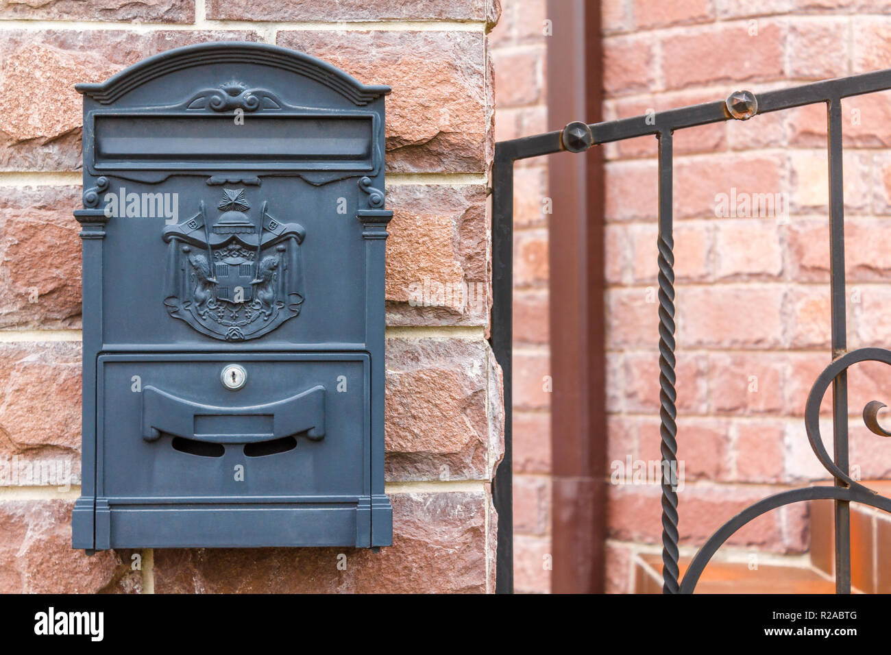 A beautiful mailbox hangs waiting for newspapers, parcels and letters ...