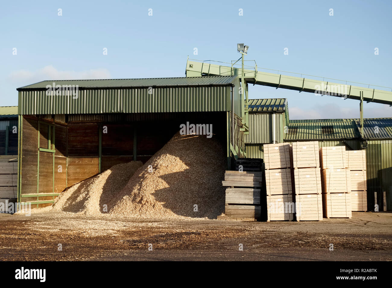 Sawmill factory wood chips hopper and machine cutter Stock Photo - Alamy
