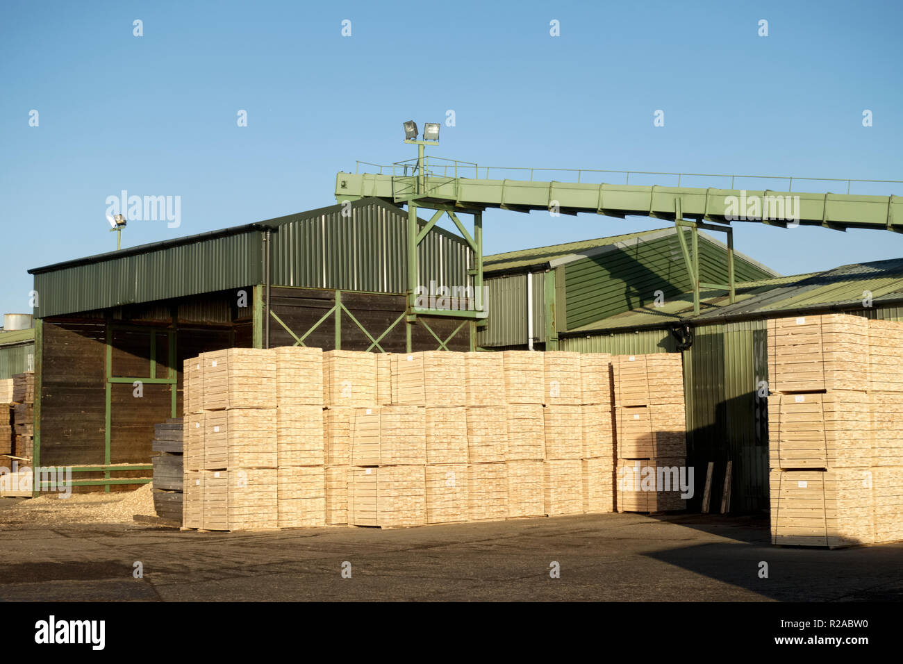 Sawmill factory wood chips hopper and machine cutter Stock Photo - Alamy