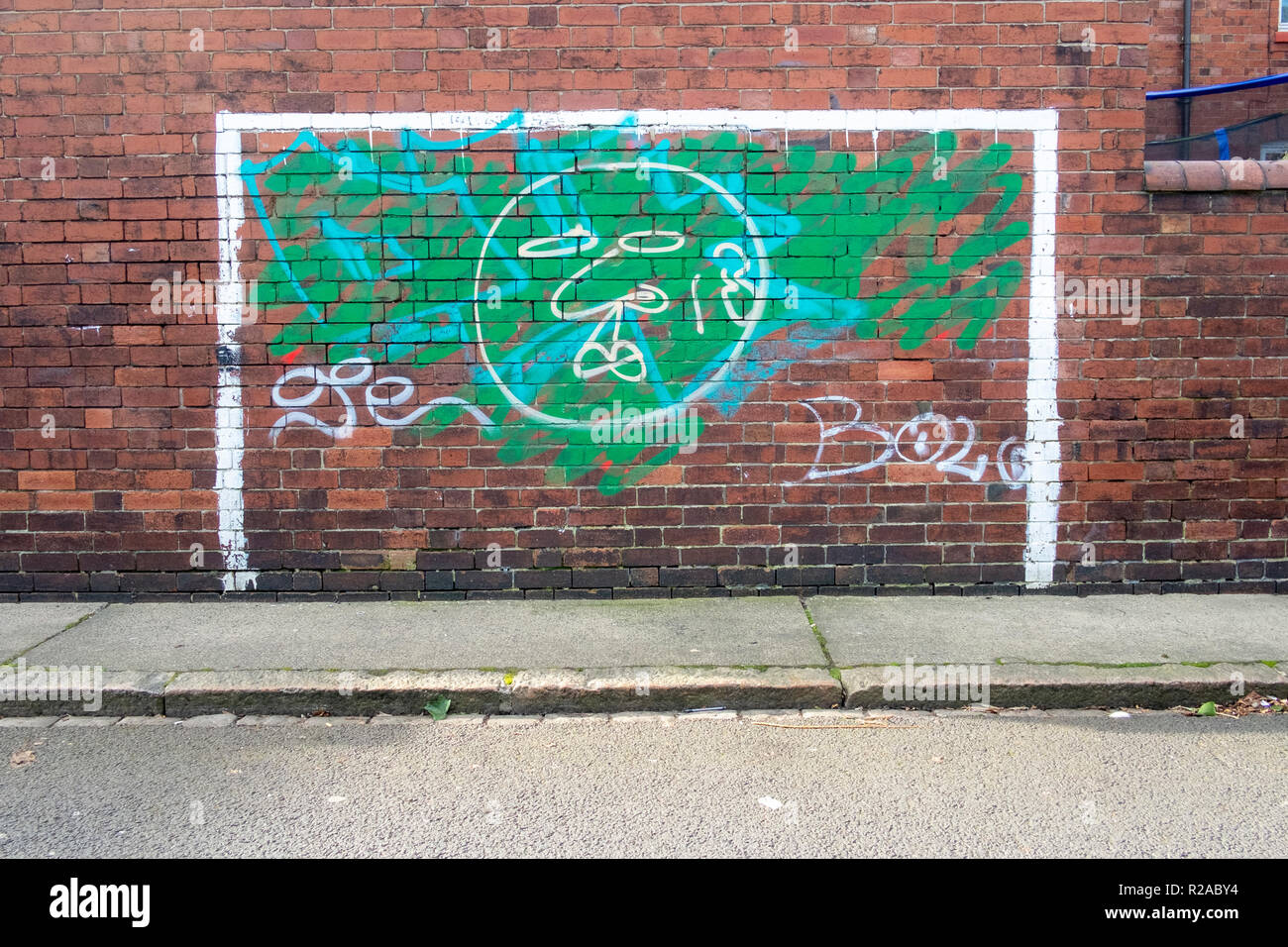 Goal posts painted on terraced wall in North England Stock Photo - Alamy