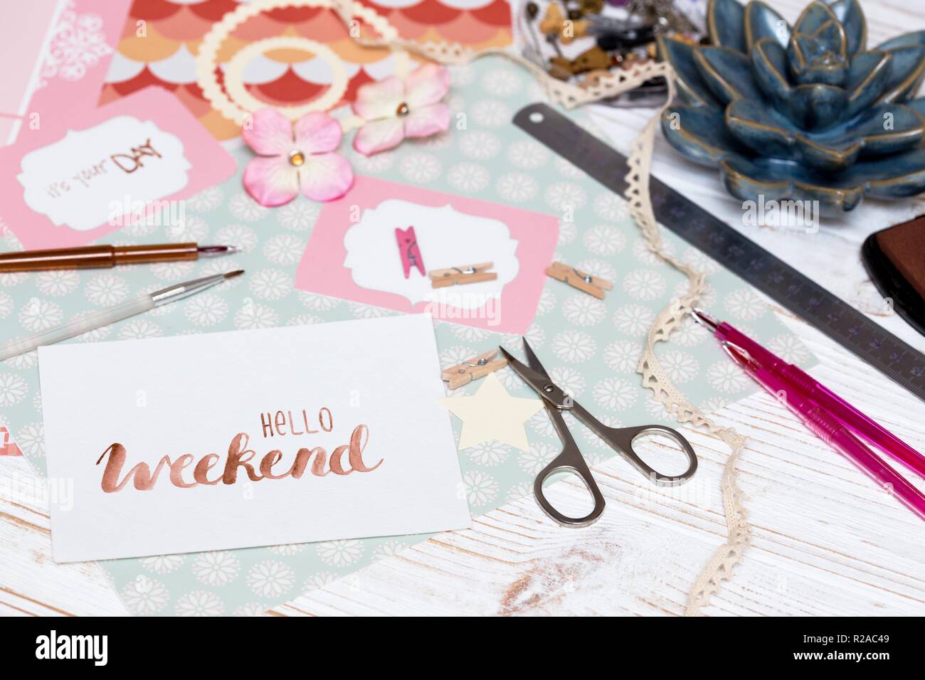 scrapbook background. hello weekend - process of creating a postcard ...