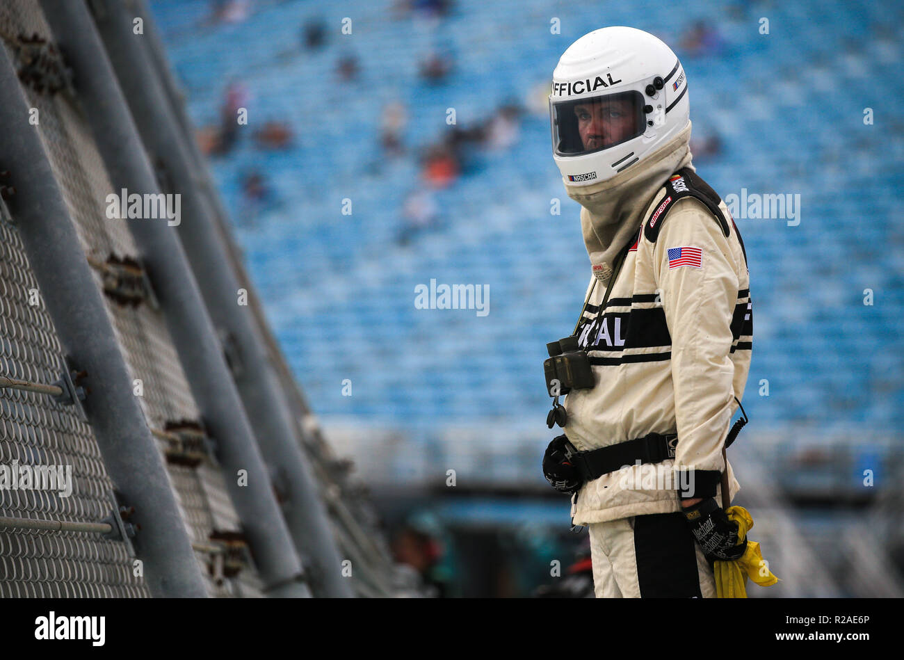 Homestead, Fla, USA. 17th Nov, 2018. A NASCAR official follows the race ...