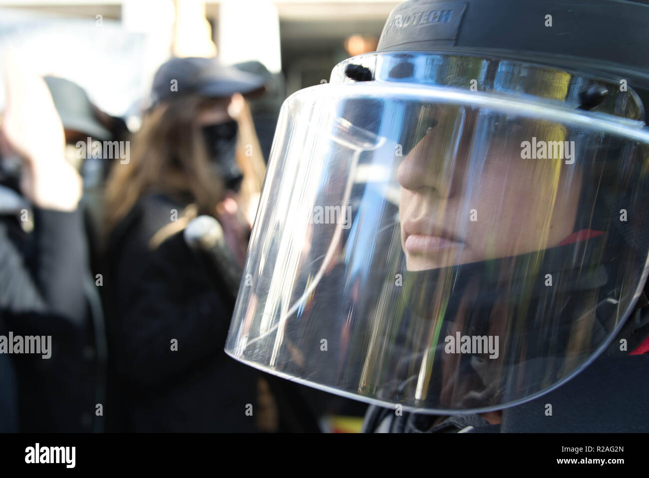 Riot police face guard hi-res stock photography and images - Alamy