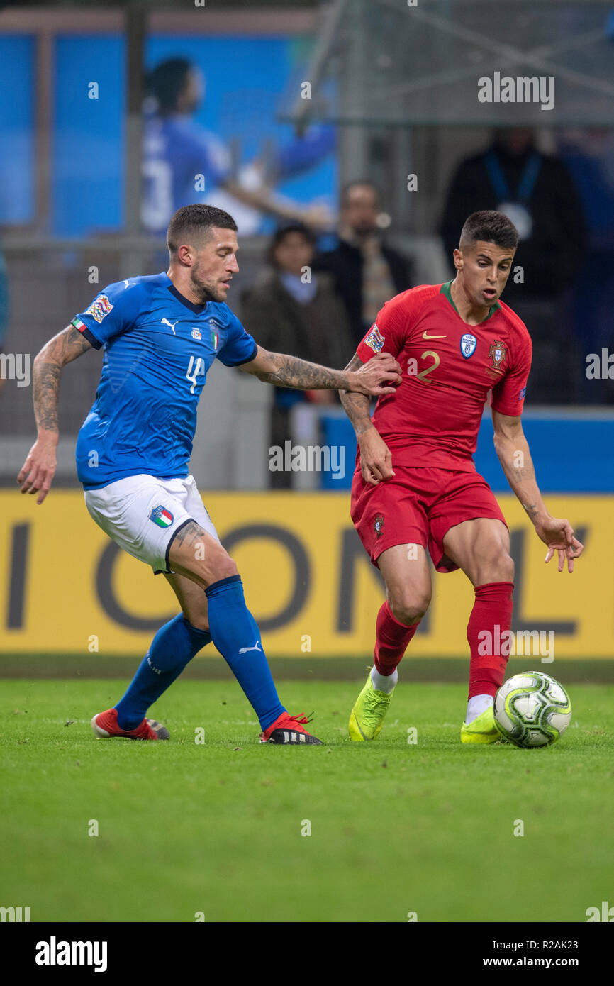 Milan, Italy. 17th November 2018. Cristiano Biraghi (Italy) Joao Pedro ...