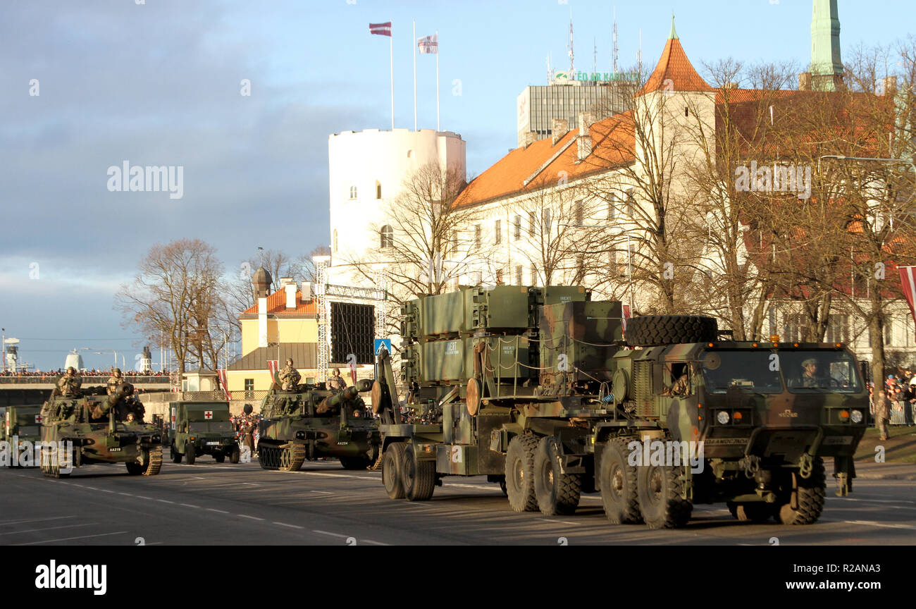 Riga, Latvia. 18th Nov, 2018. Armoured vehicles drive through the city ...