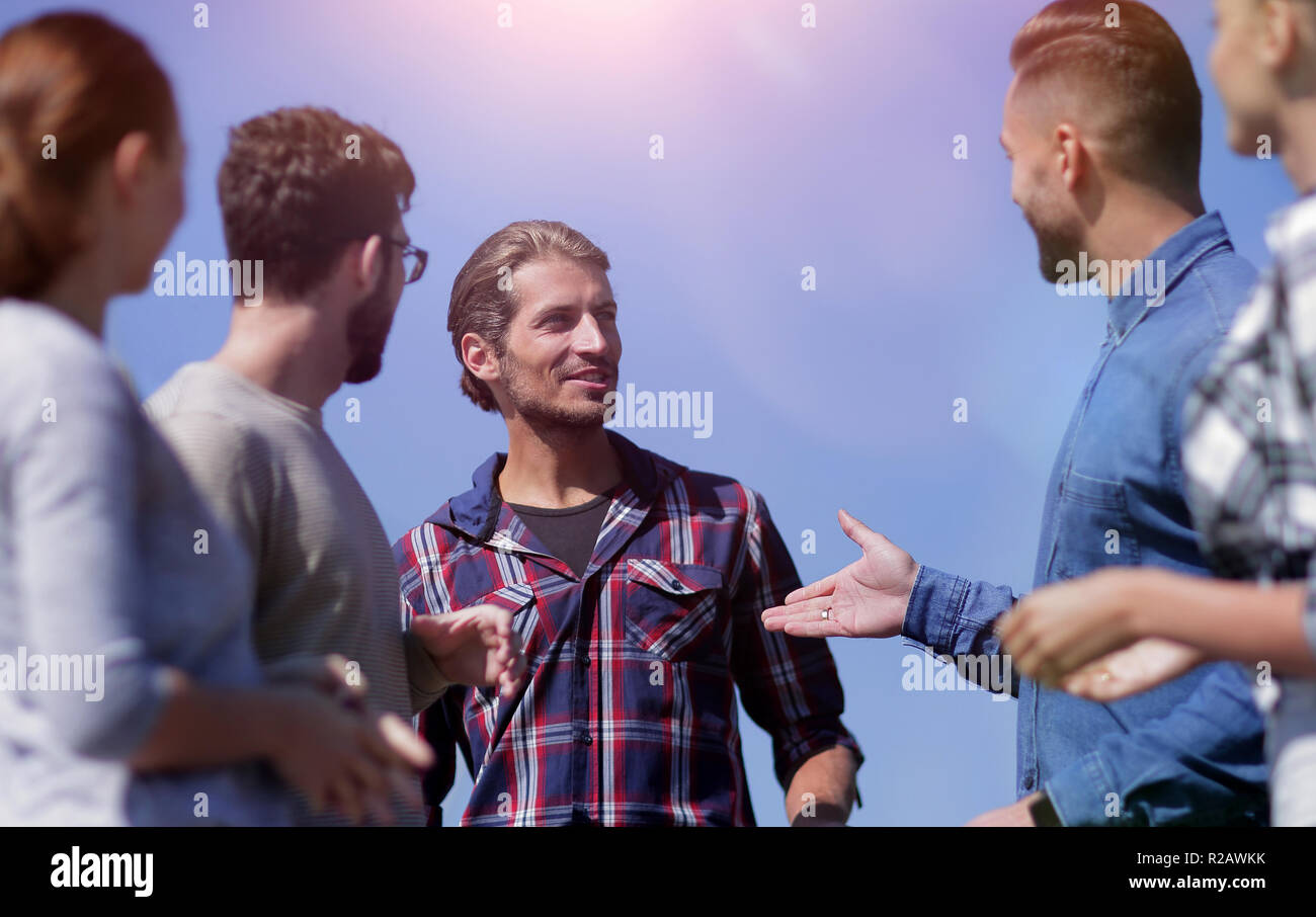 closeup .a team of friends is discussing Stock Photo - Alamy