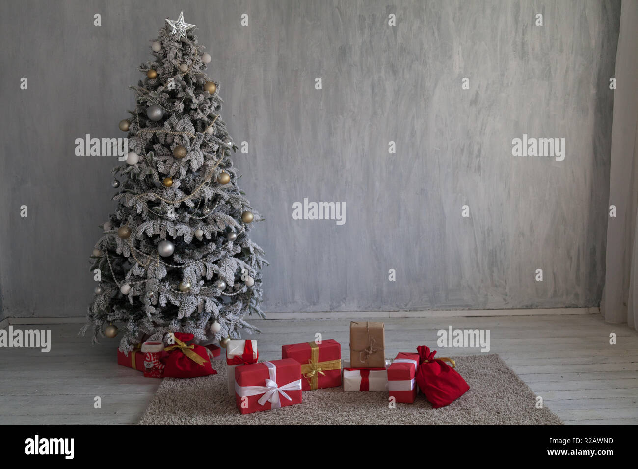 Christmas Interior home decor gifts new year tree Stock Photo - Alamy