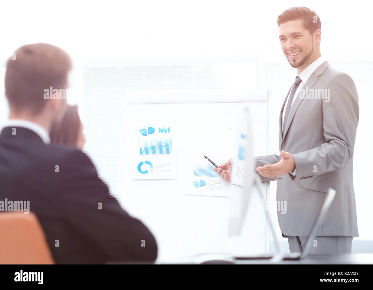 Business man making a presentation in the office Stock Photo - Alamy