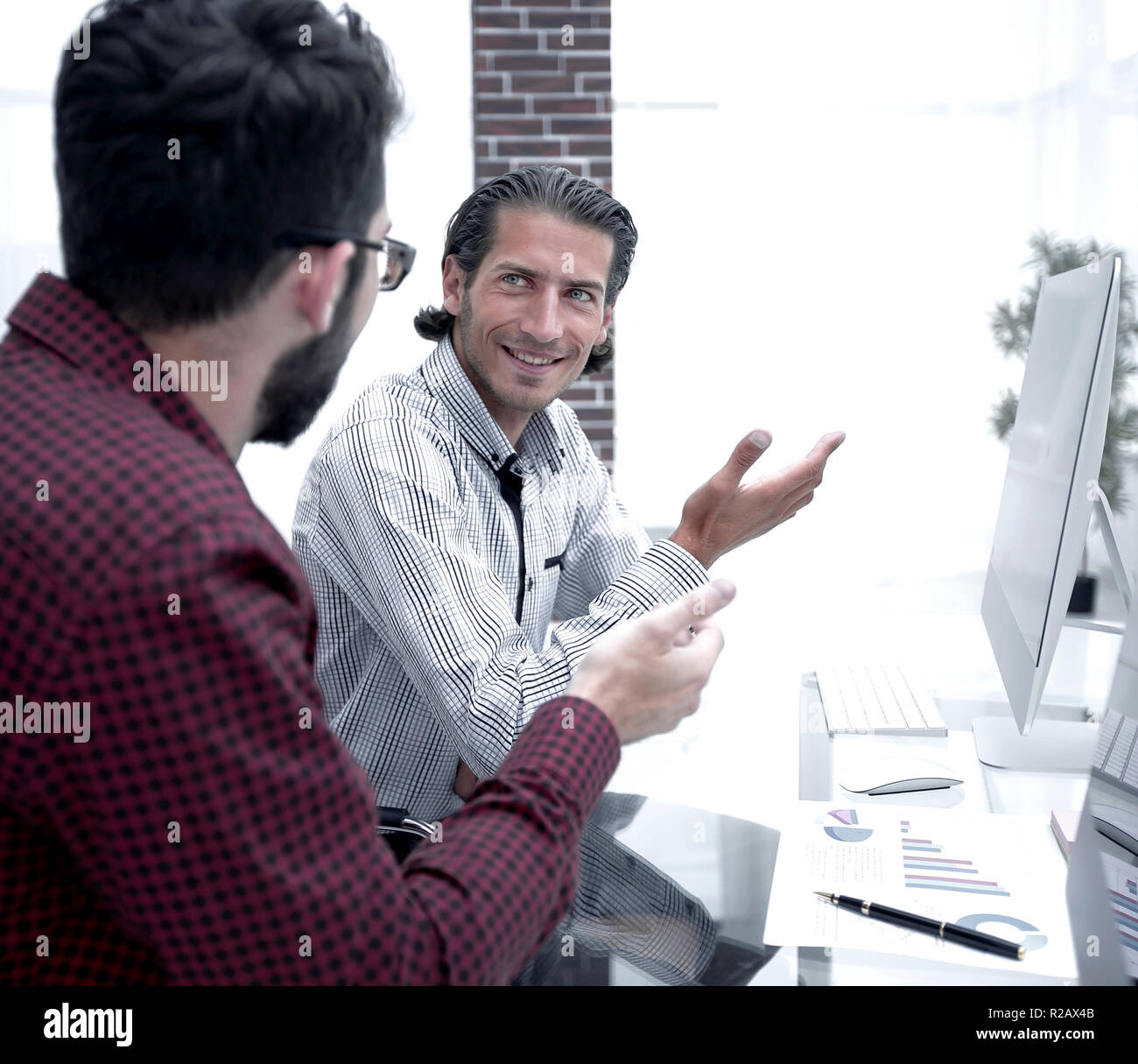 two employees work in the office Stock Photo - Alamy