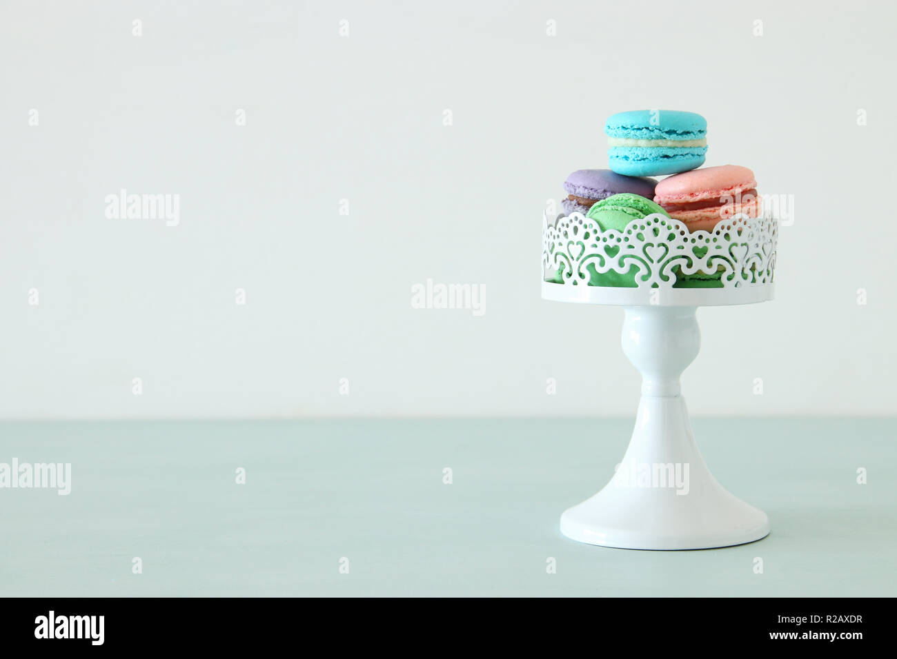 Image of colorful macaron or macaroon over pastel background Stock ...