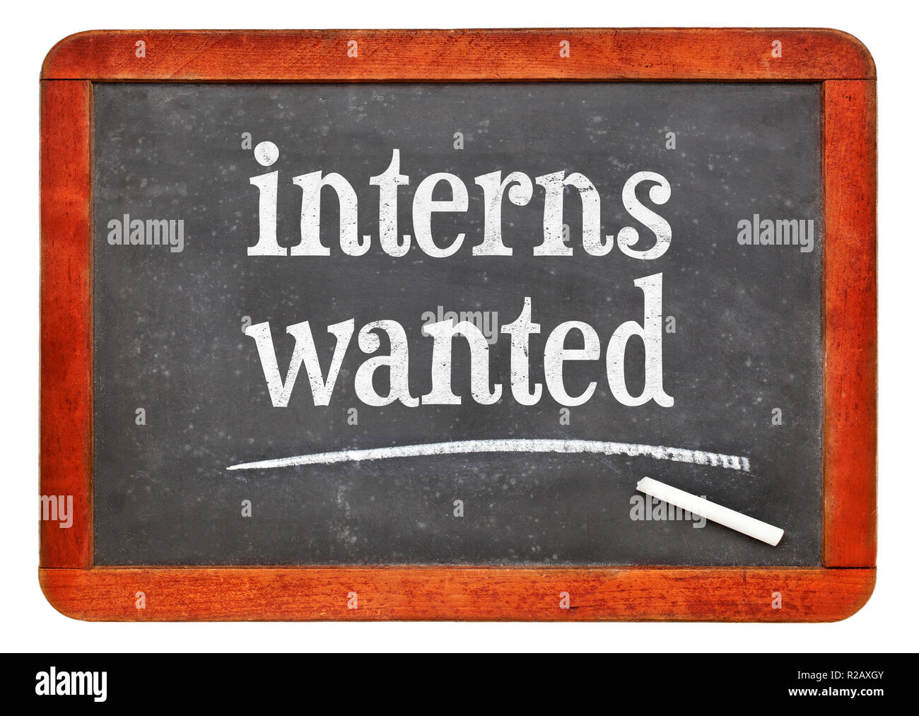 Interns wanted sign - white chalk text on a vintage slate blackboard ...