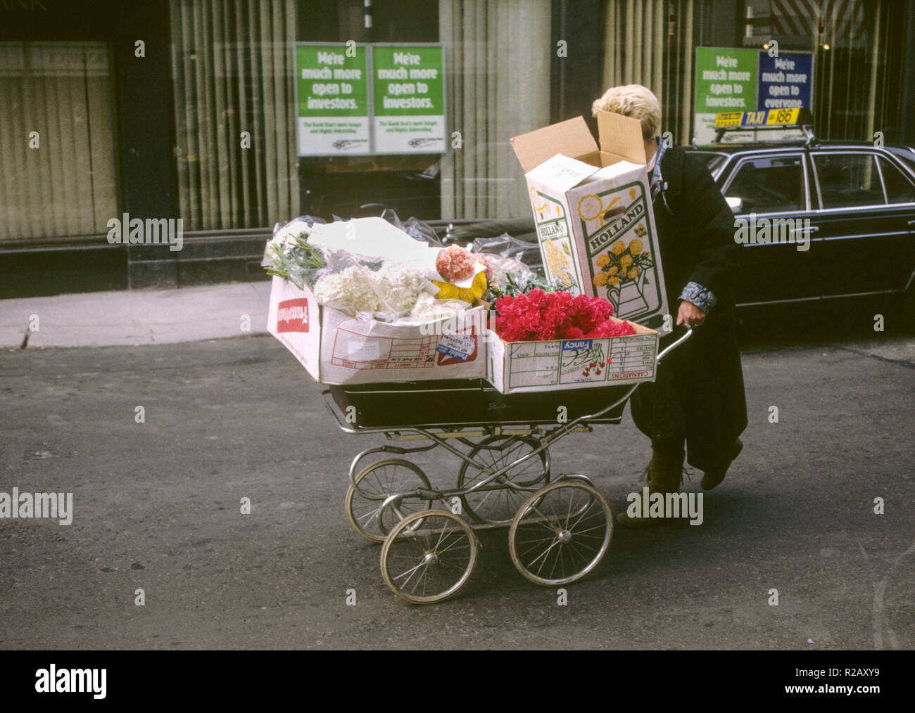 IRELAND Dublin flower vendor with flowers in a pram on the way to the ...