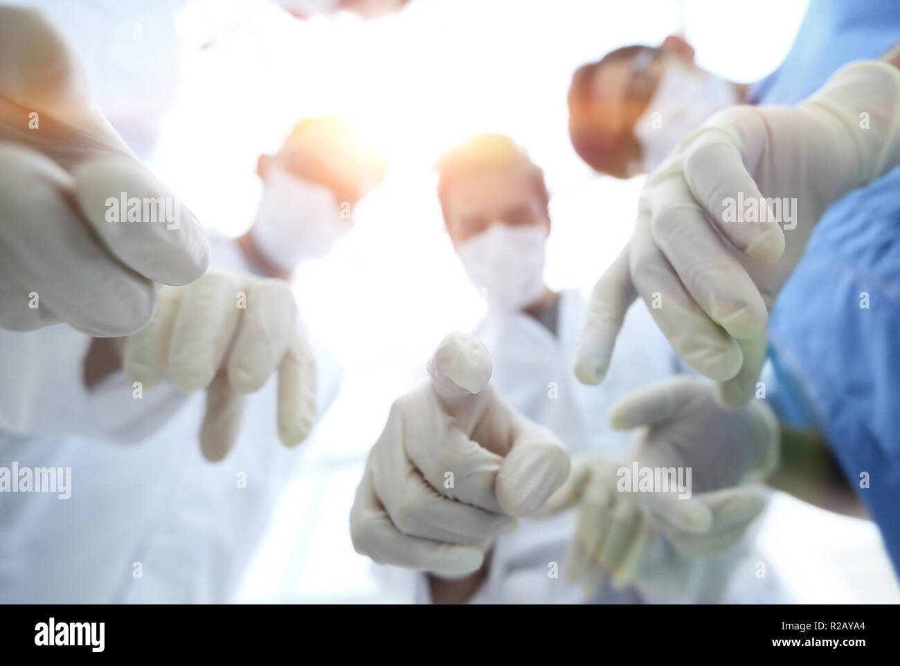 bottom view.a group of doctors in the operating room Stock Photo - Alamy