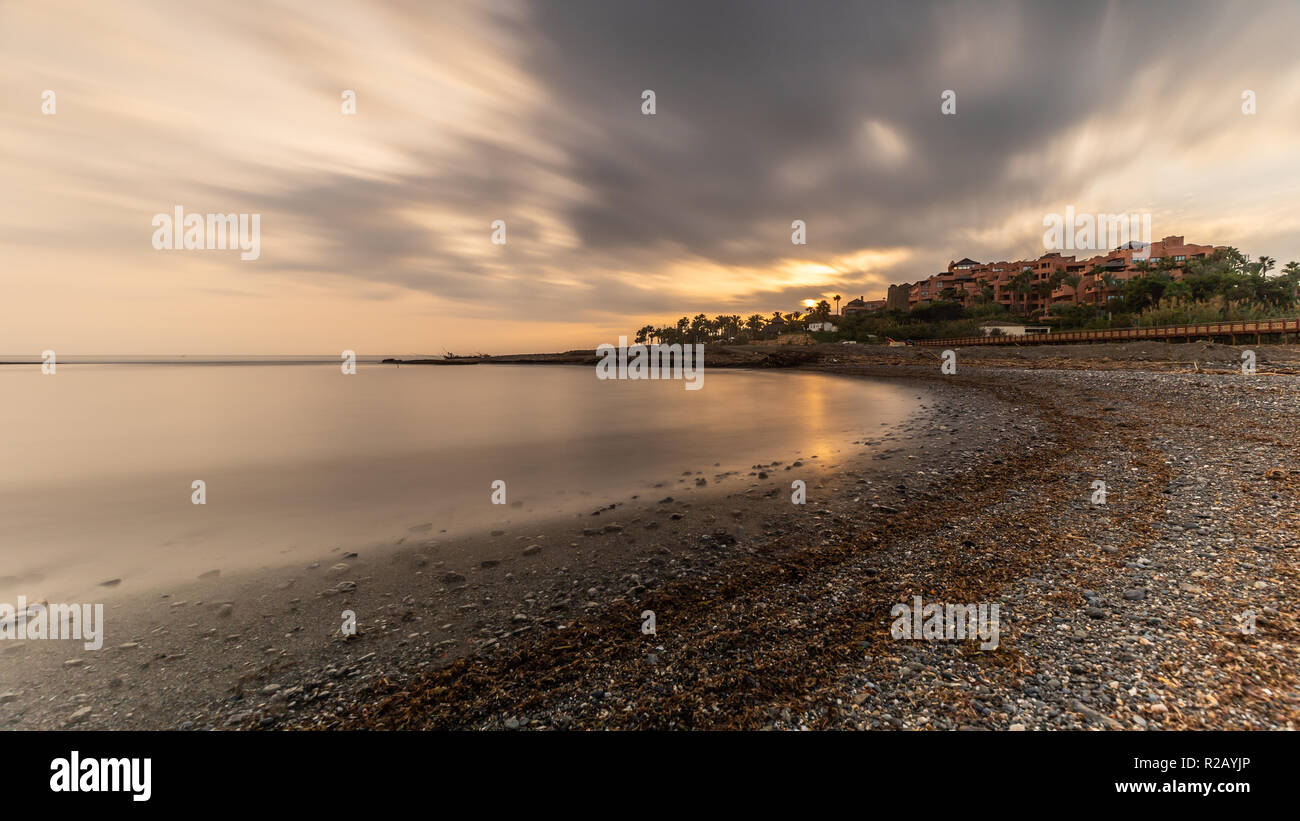 Long Exposure of a beach at sunset Stock Photo - Alamy