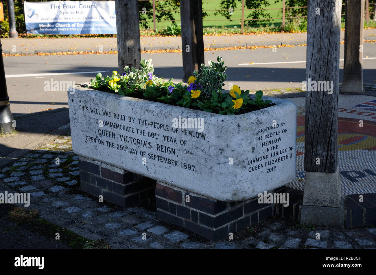 Planted trough at the Well, Henlow, Bedfordshire. The well was built in ...