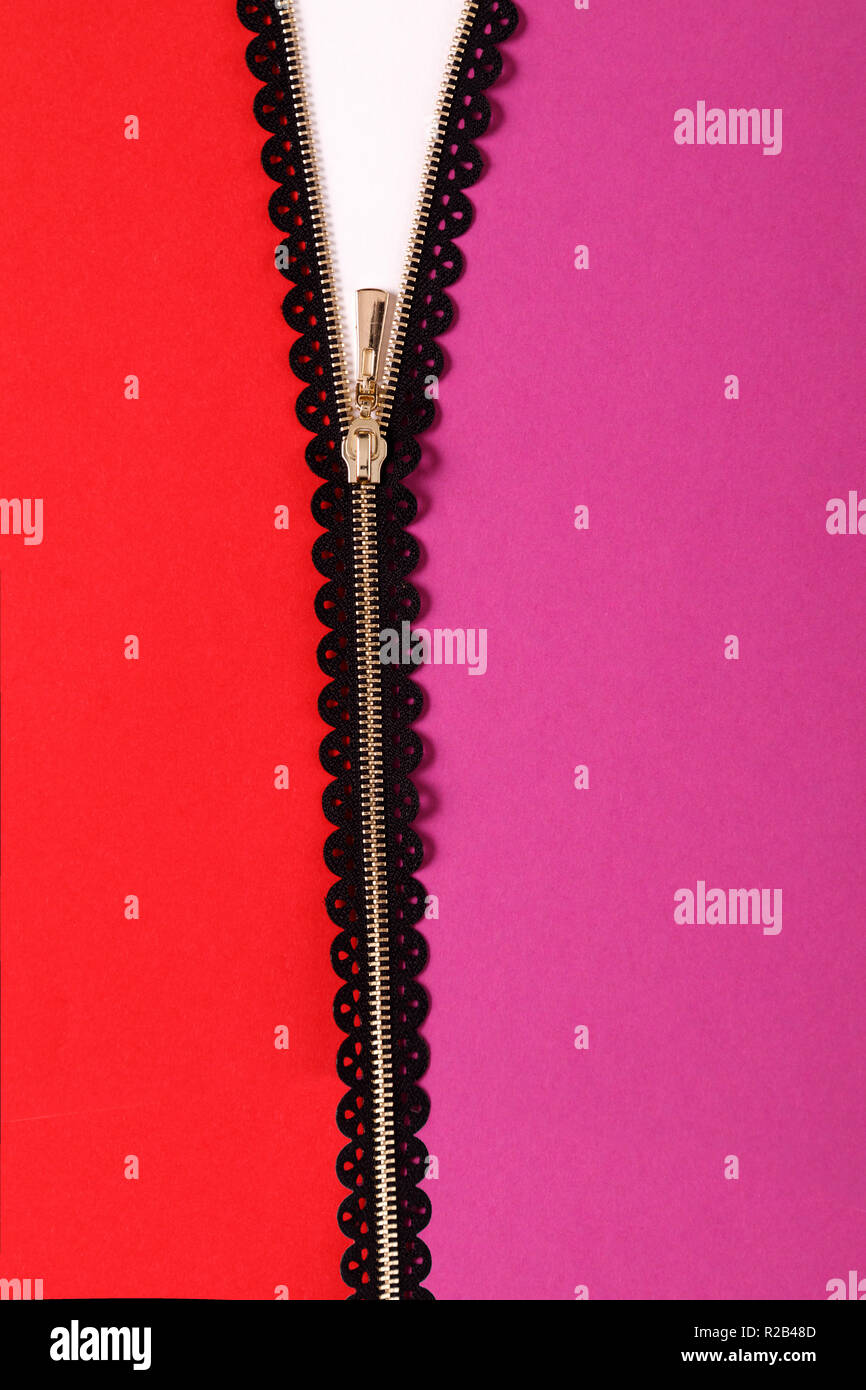 colored paper zipper. colors are connected by zipper Stock Photo - Alamy