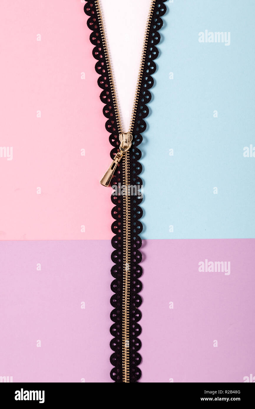 colored paper zipper. colors are connected by zipper Stock Photo - Alamy