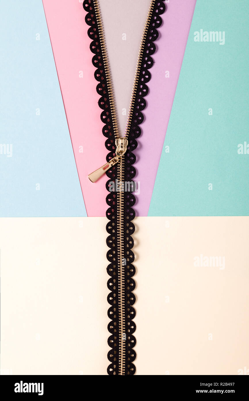 colored paper zipper. colors are connected by zipper Stock Photo - Alamy