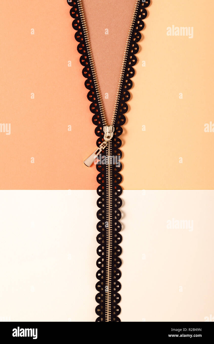 colored paper zipper. colors are connected by zipper Stock Photo - Alamy