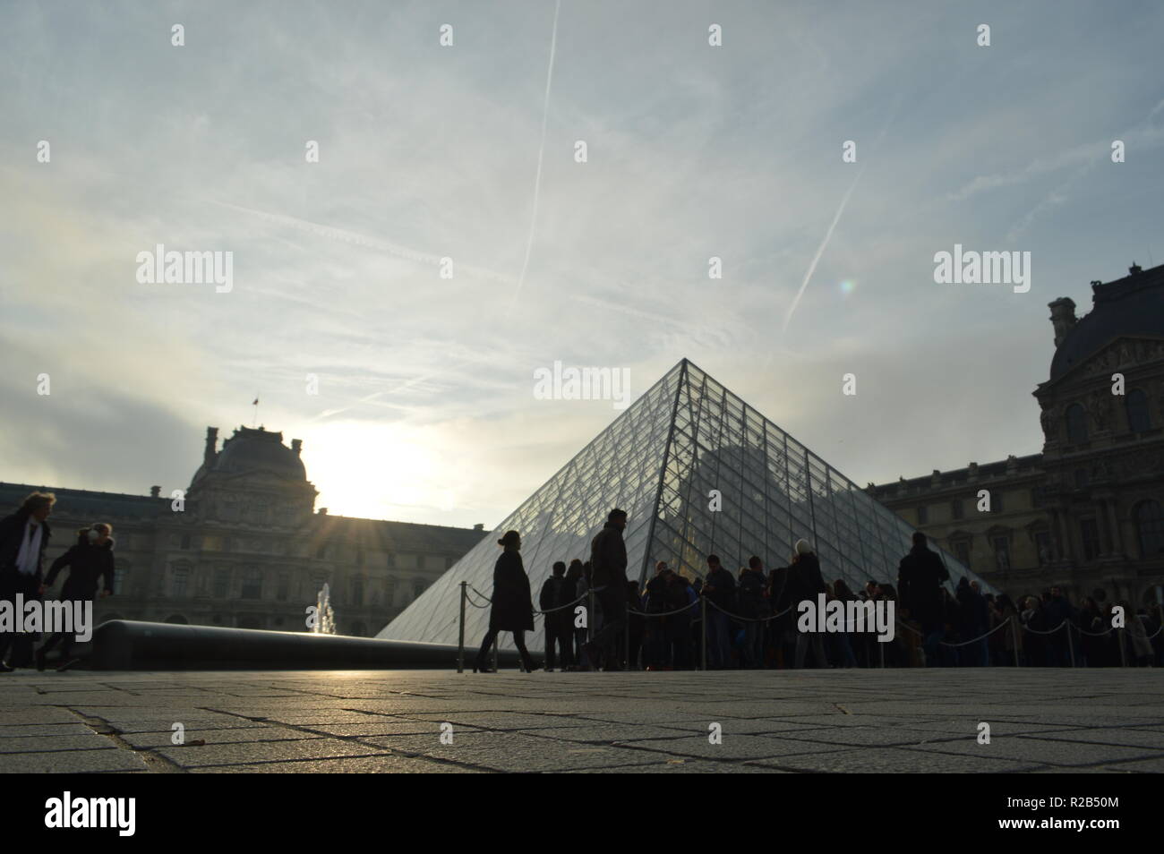 Louvre pyramid sunset hi-res stock photography and images - Alamy