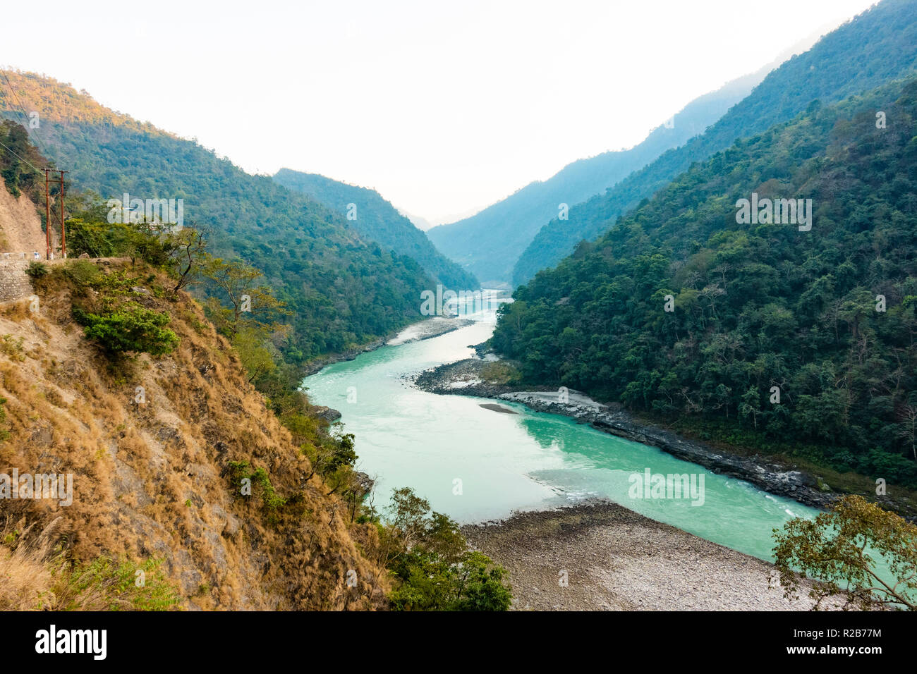 Spectacular view of the sacred Ganges river flowing through the green ...