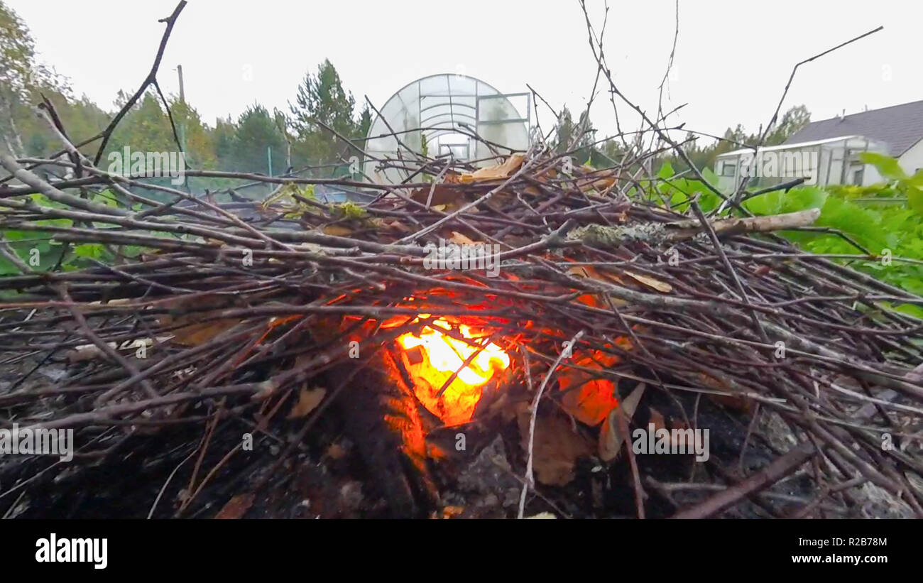 The fire is ignited in a fire of twigs and branches Stock Photo - Alamy