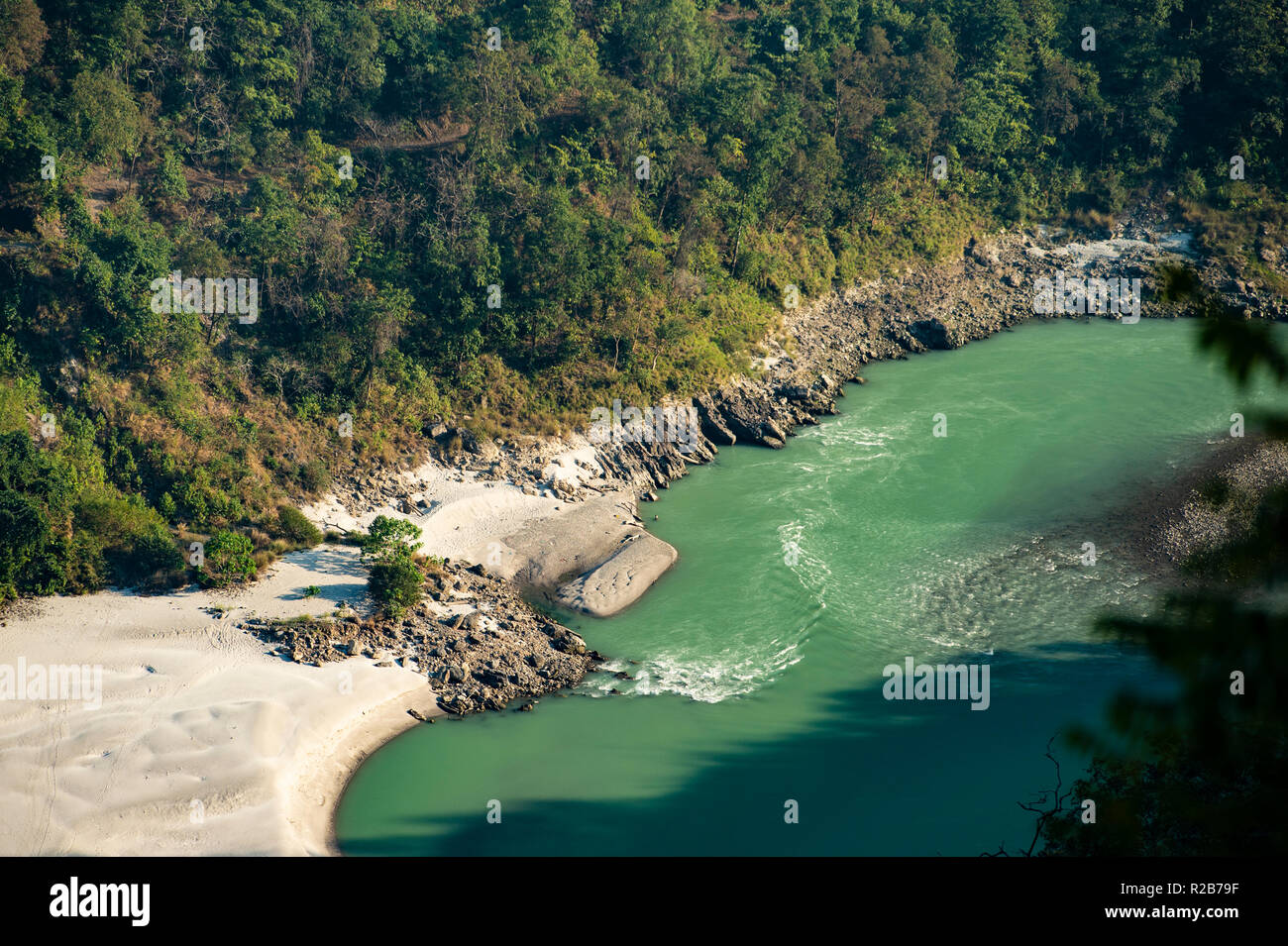Spectacular view of the sacred Ganges river flowing through the green ...