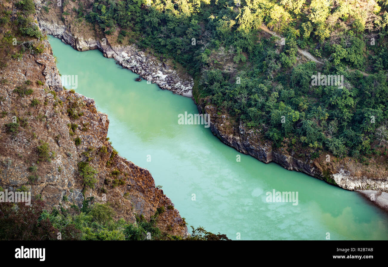 Spectacular view of the sacred Ganges river flowing through the green ...