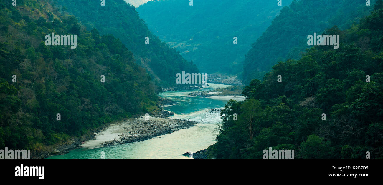 Spectacular view of the sacred Ganges river flowing through the green ...