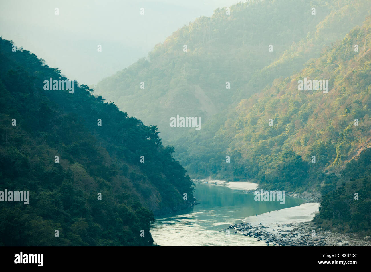 Spectacular view of the sacred Ganges river flowing through the green ...