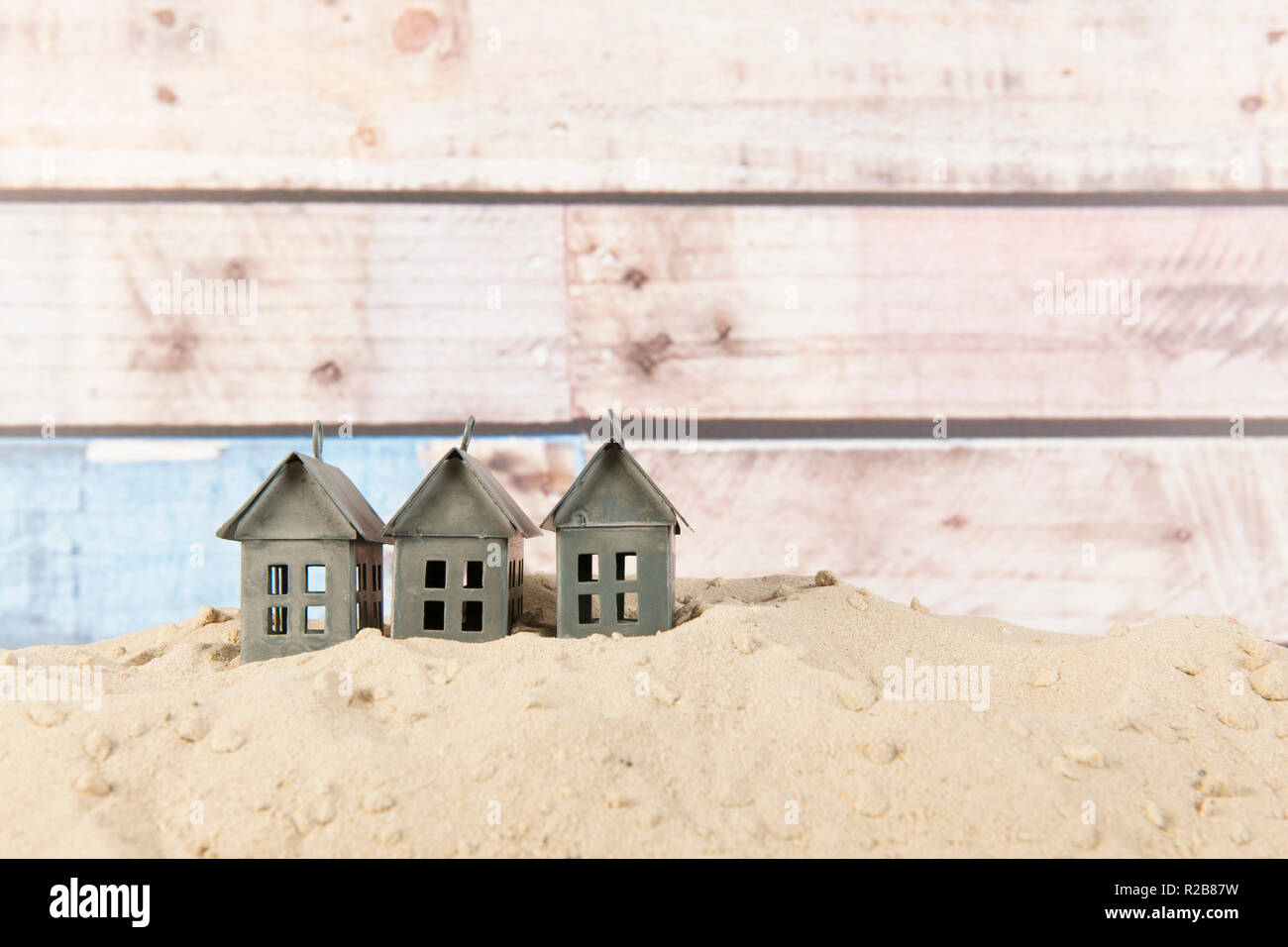 Little metal houses in a row at the beach Stock Photo - Alamy