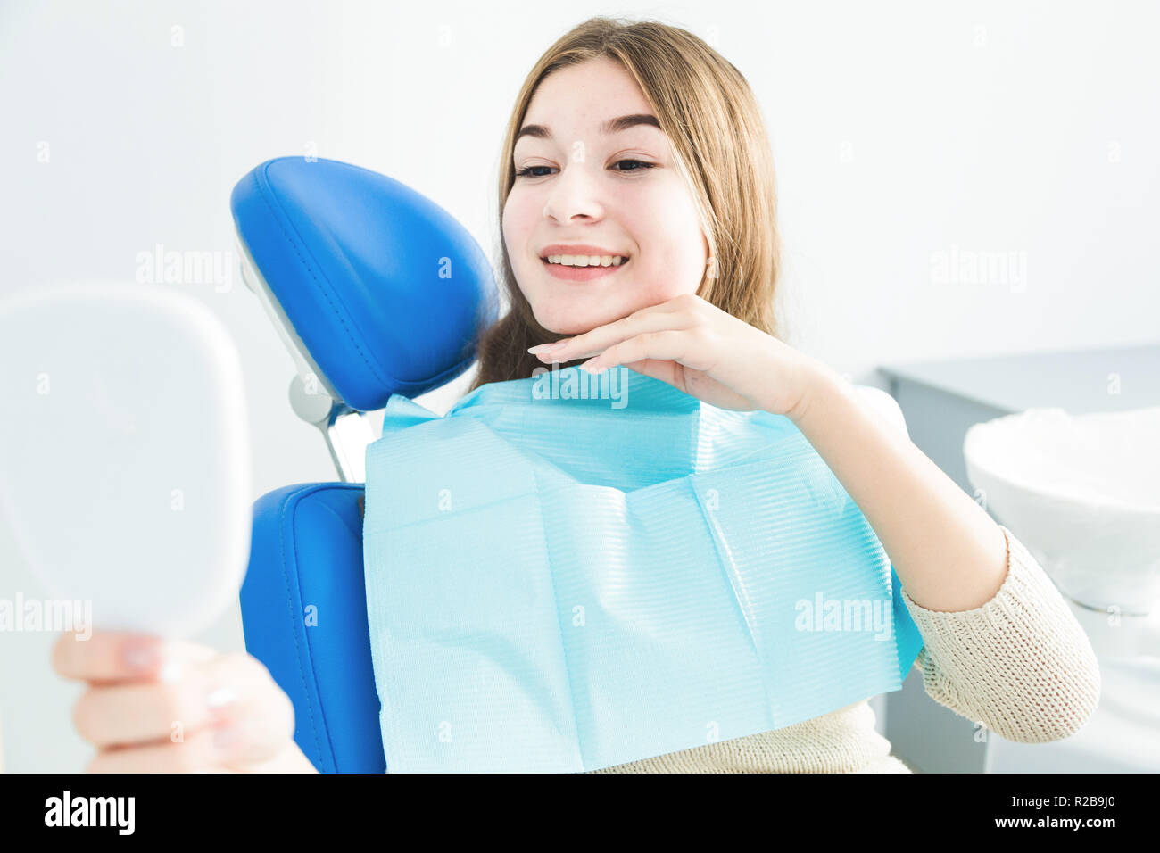 Dental clinic. Reception, examination of the patient. Teeth care. Young ...