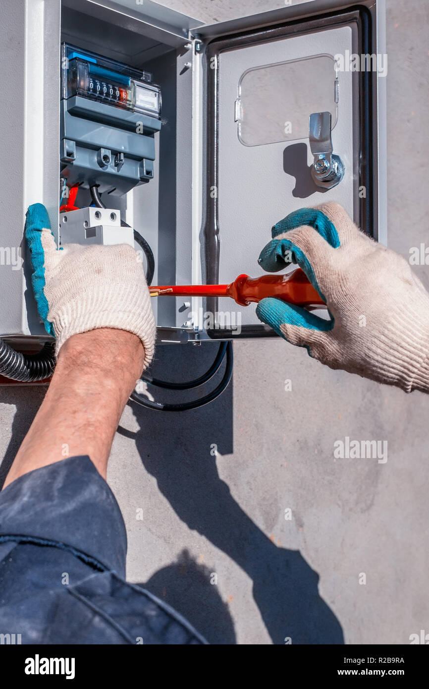 Replacing the old electricity meter with a new one. Repair of ...