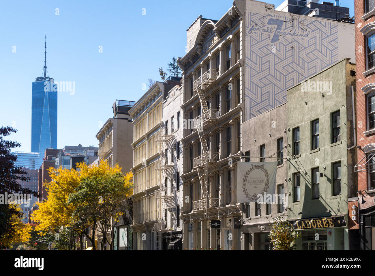 SoHo cast iron historic neighborhood with One World Trade building in ...