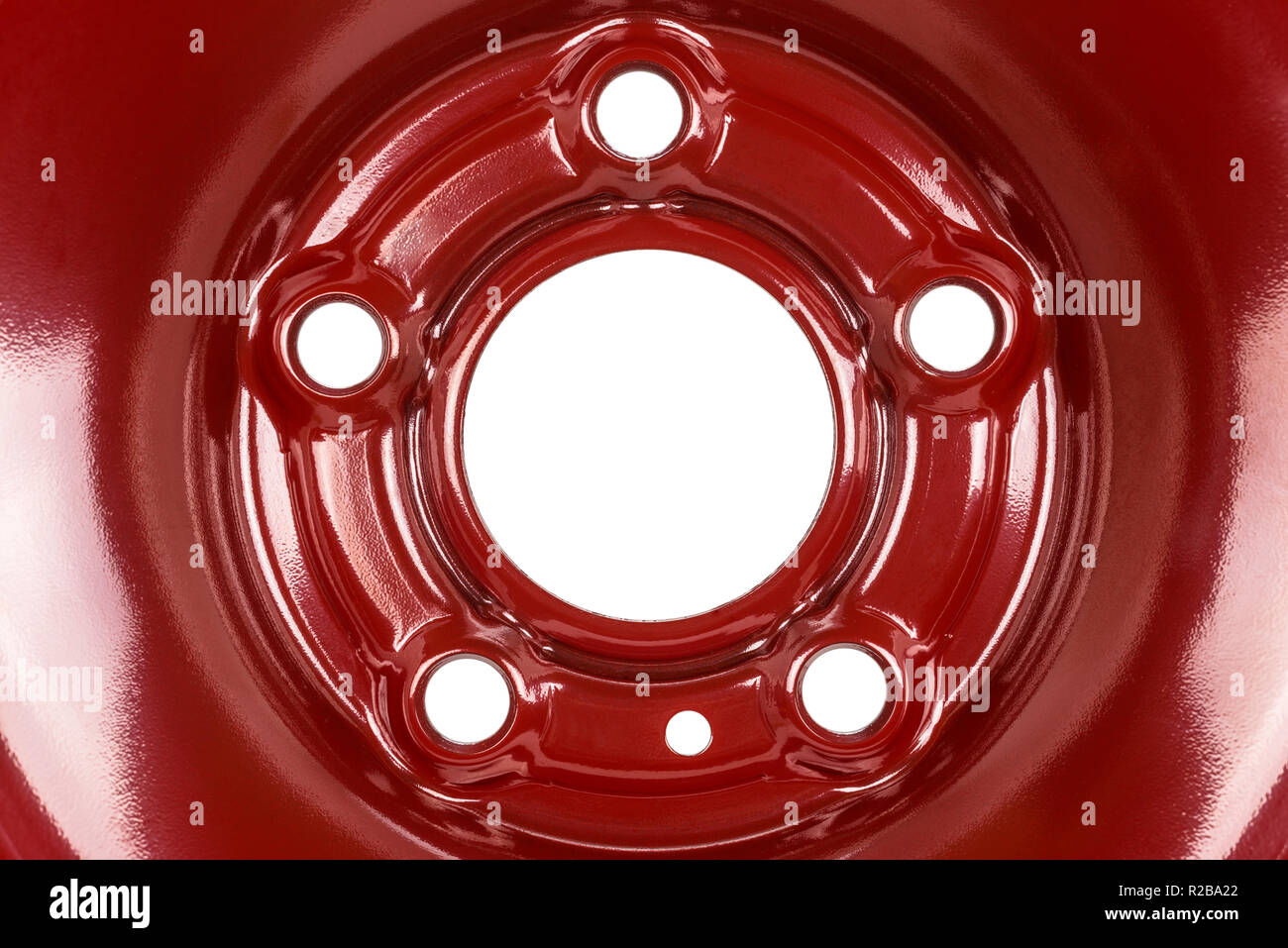 Steel wheel rim close up in red color. Isolated on a white background ...