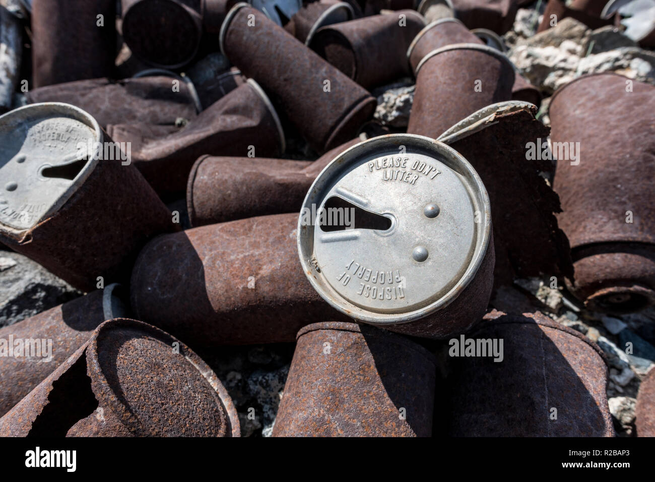 Rusted cans disposed in the nature Stock Photo - Alamy