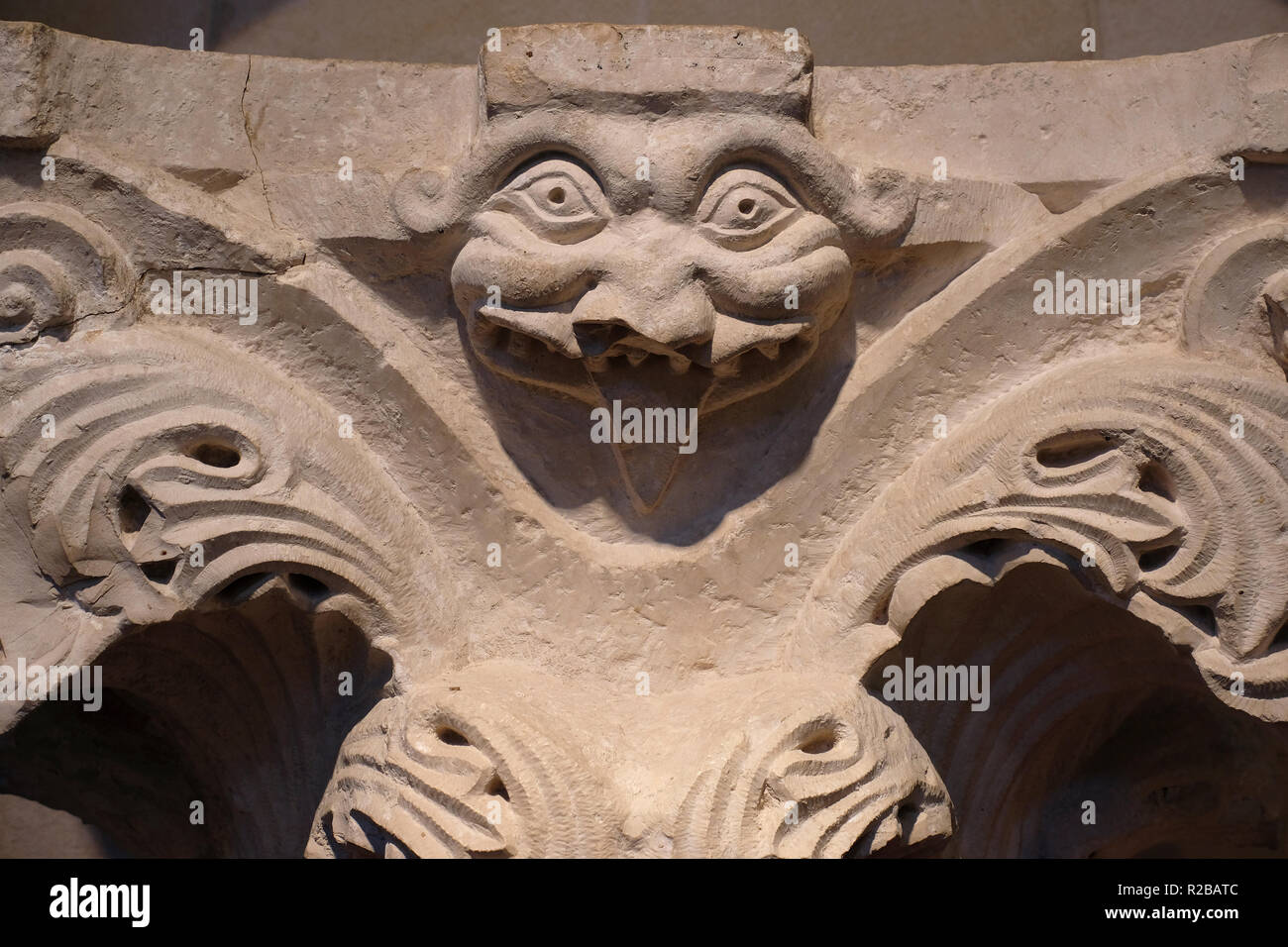 Limestone acanthus capital decorated with the head of a monster from ...