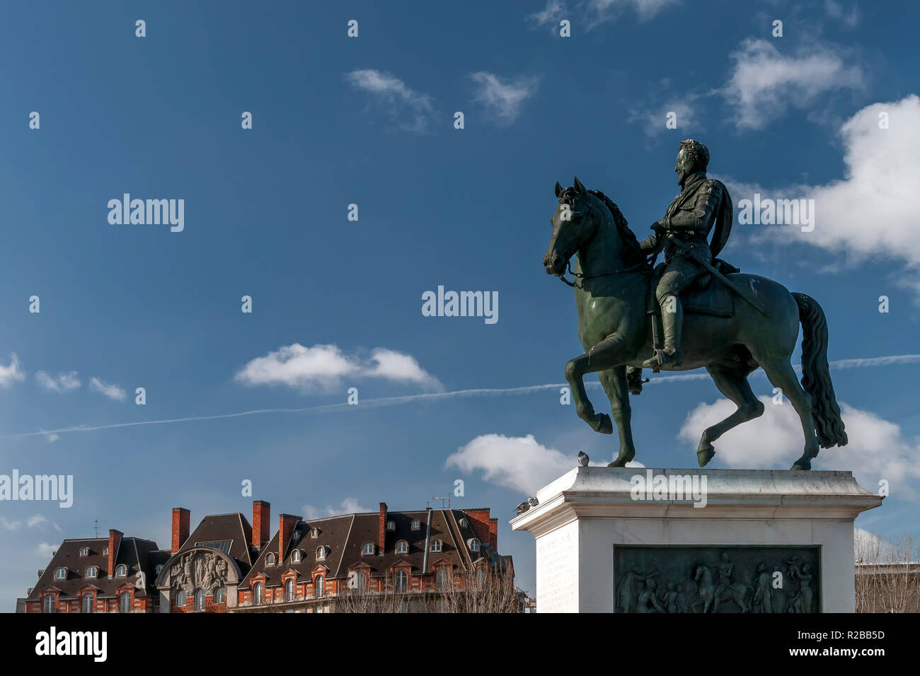 Equestrian statue of Henry IV on the Pont Neuf in Paris, France, with a ...