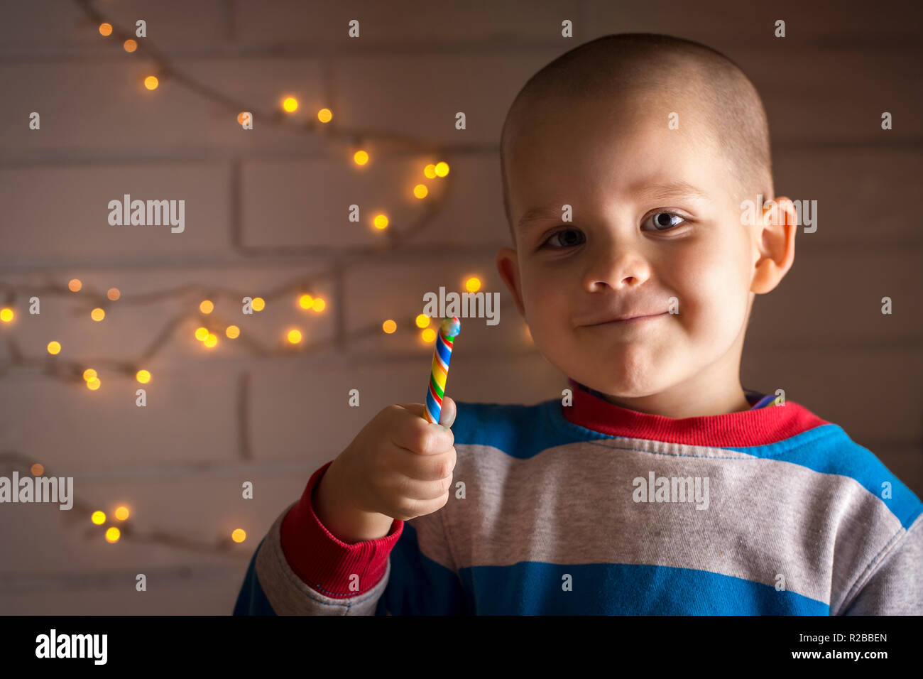 Boy with candy Stock Photo - Alamy