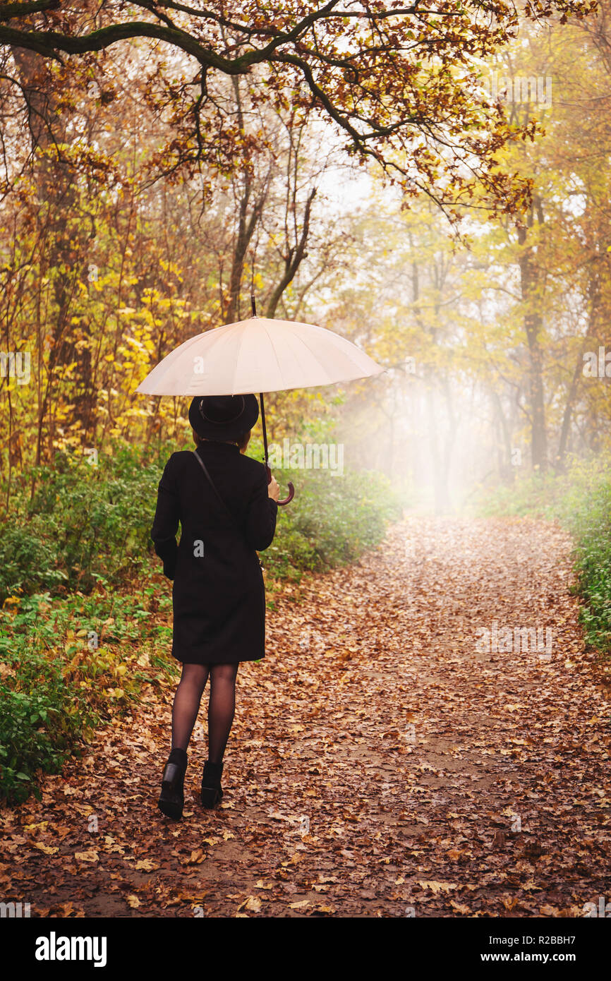 woman under the umbrella Stock Photo - Alamy