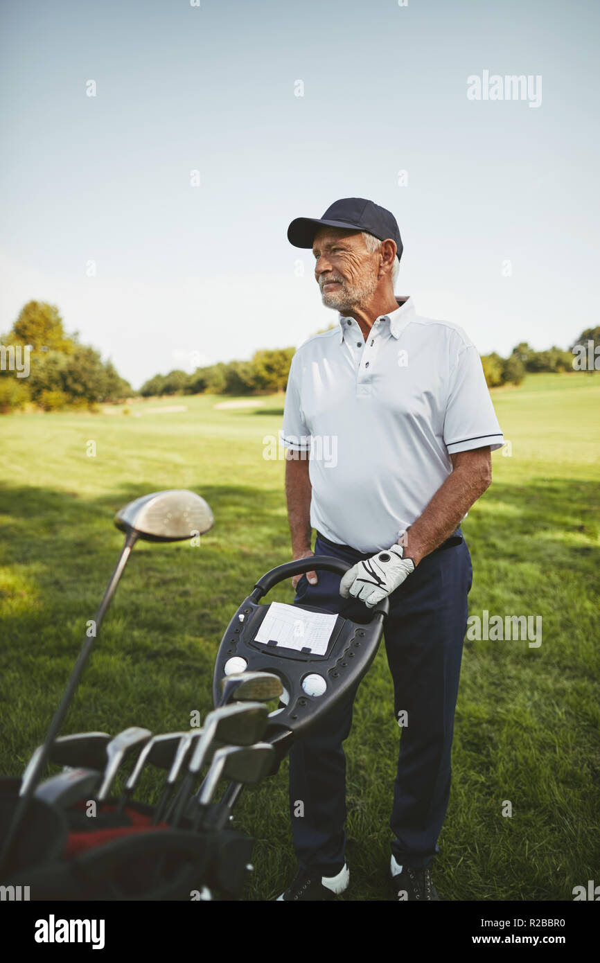 Old man playing golf hi-res stock photography and images - Alamy