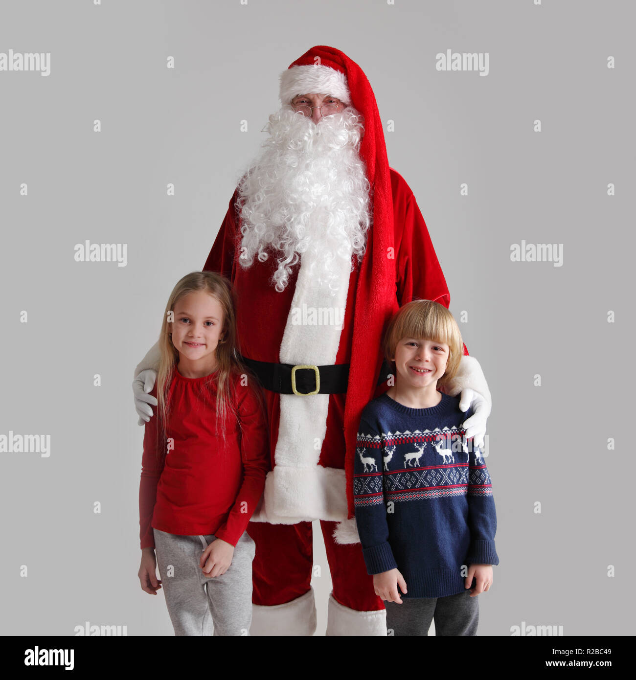 Two children with santa claus hi-res stock photography and images - Alamy
