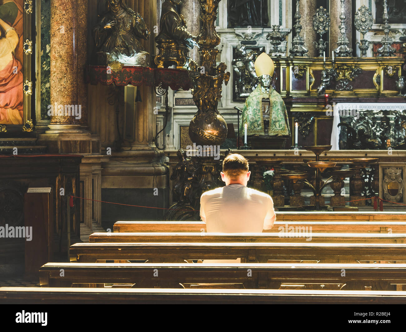 Praying Alone Catholic Church Stock Photos & Praying Alone Catholic ...