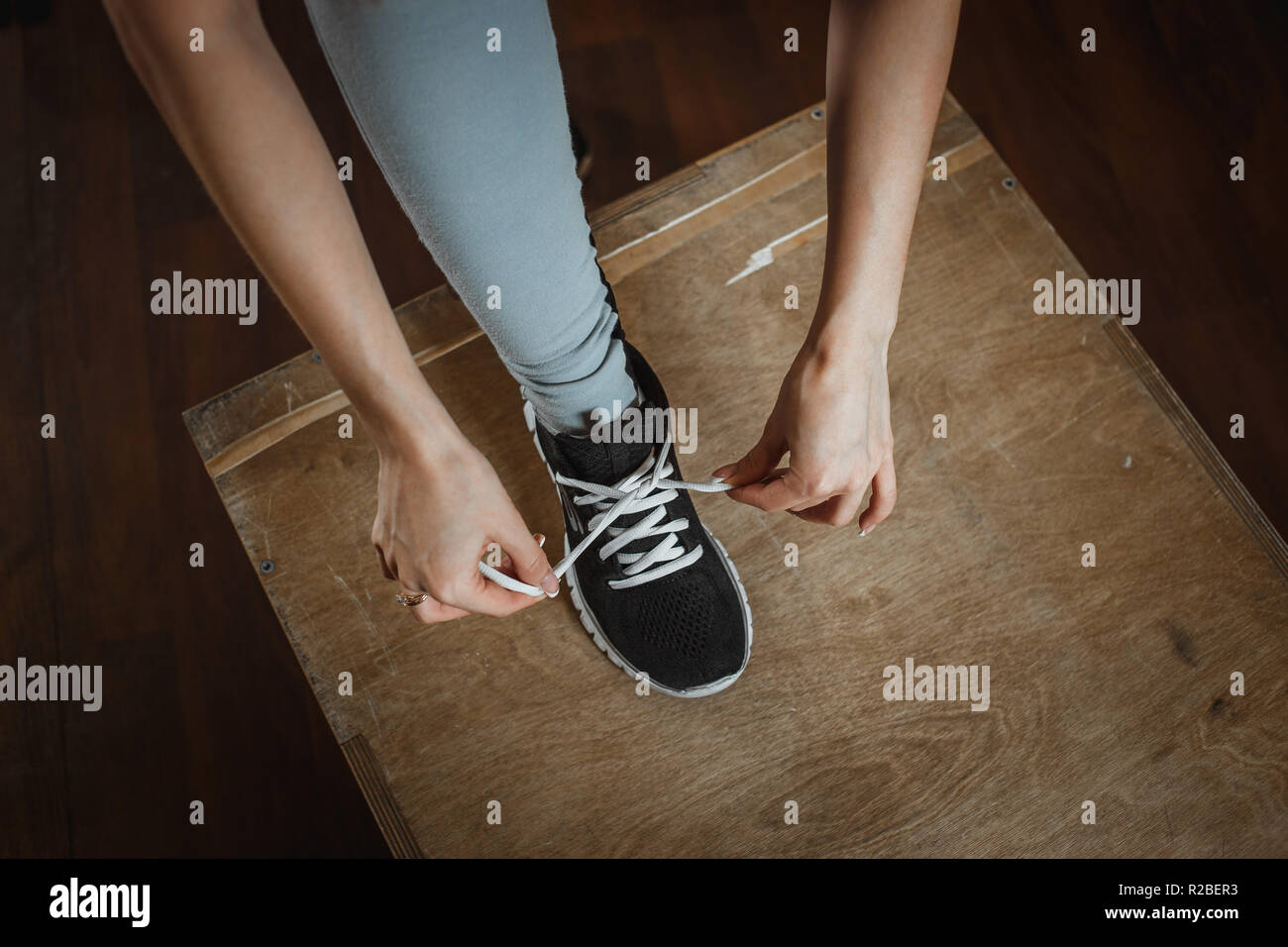 Girl putting on boot hi-res stock photography and images - Alamy