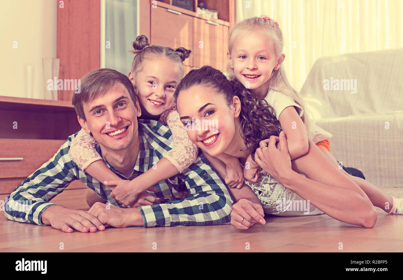 Father and two kids laying hi-res stock photography and images - Alamy